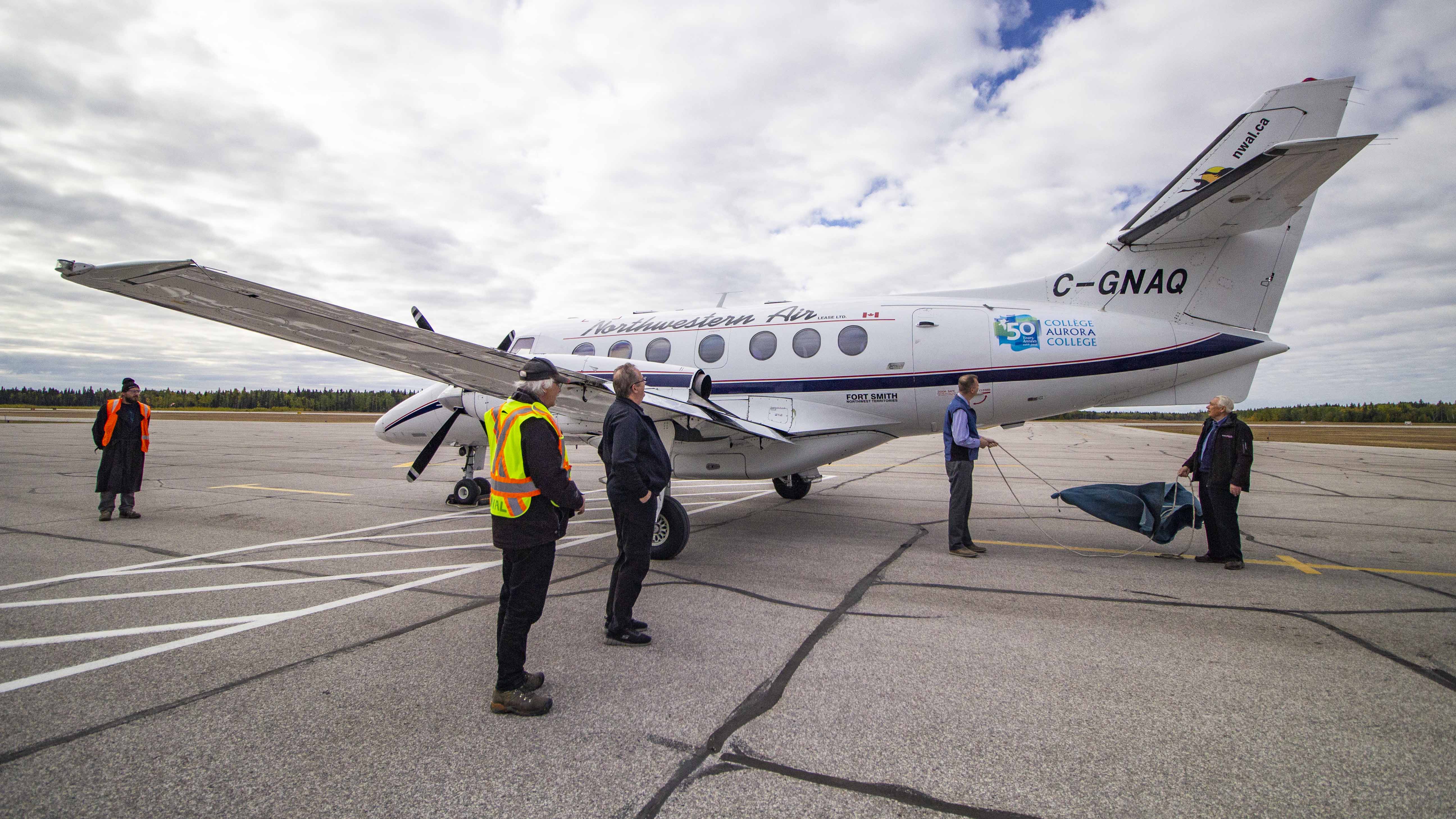 Aurora College reveals anniversary logo on Jetstream