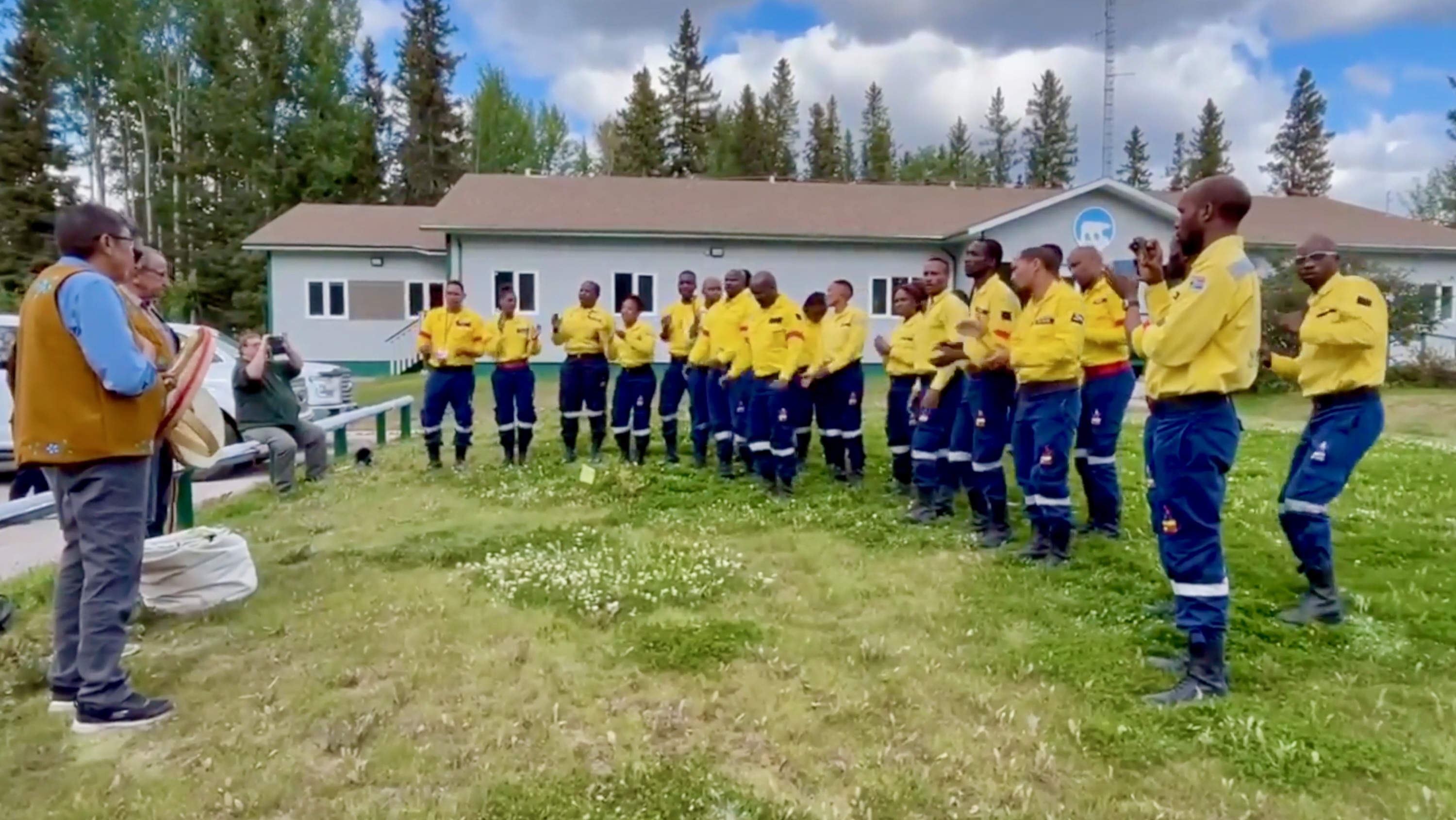 NWT residents and South African firefighters share a moment