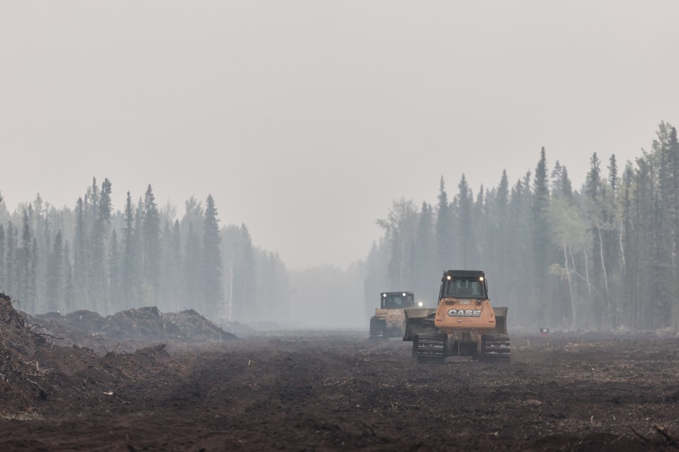 Smoked-out NWT hopes for relief from coming rain
